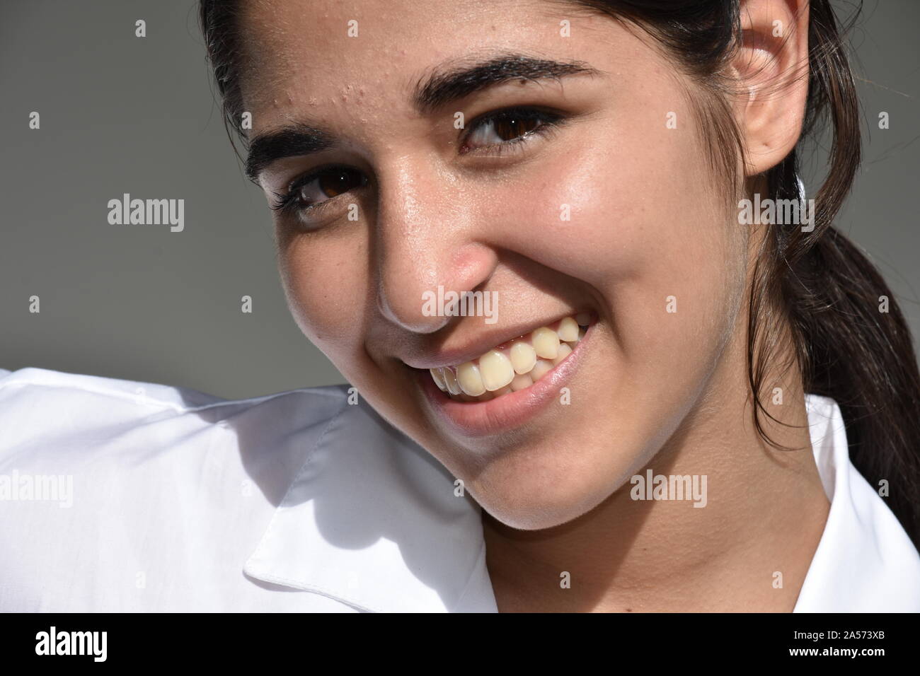 Cute Colombian Female Smiling Stock Photo - Alamy