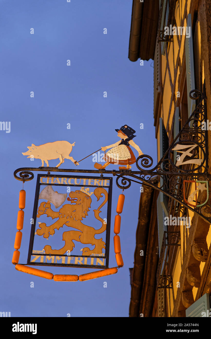 COLMAR, FRANCE, October 12, 2019 : Sign for a charcuterie surrounded by ...