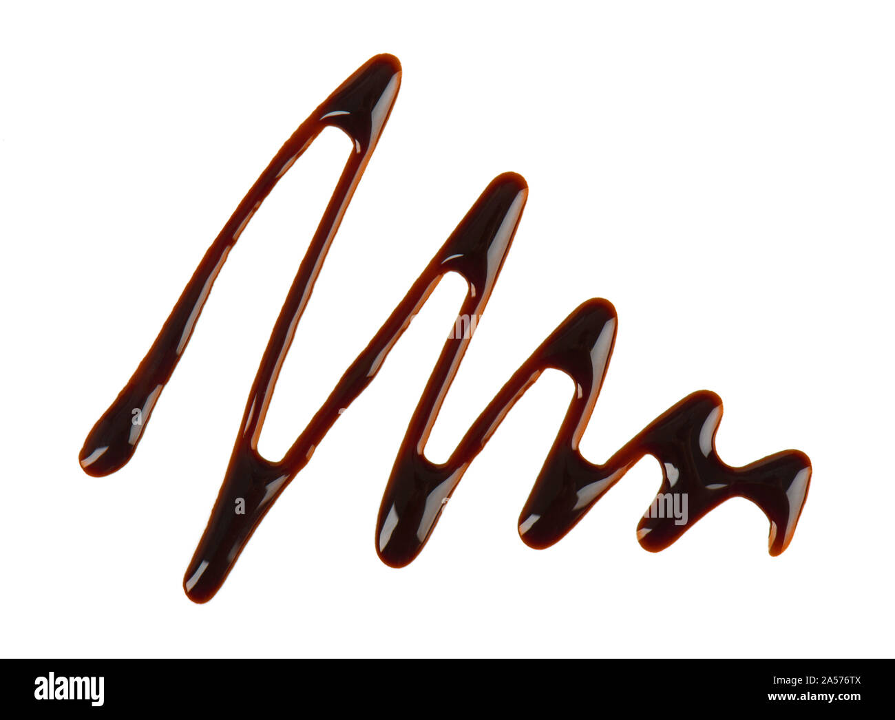 Chocolate syrup drop isolated on white background. Top view Stock Photo ...