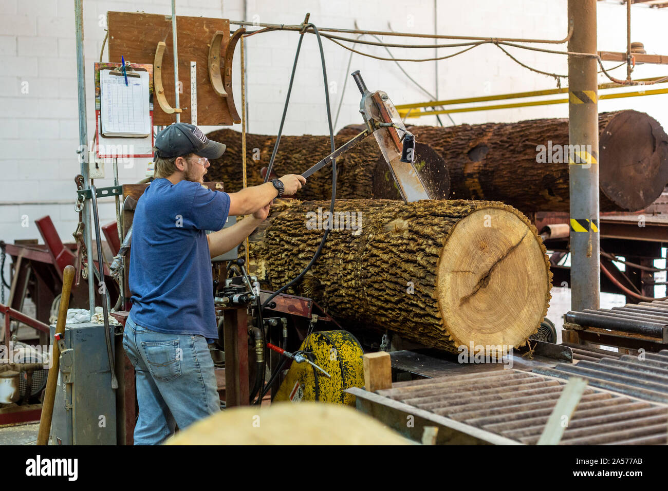 Saw mill worker hi-res stock photography and images - Alamy