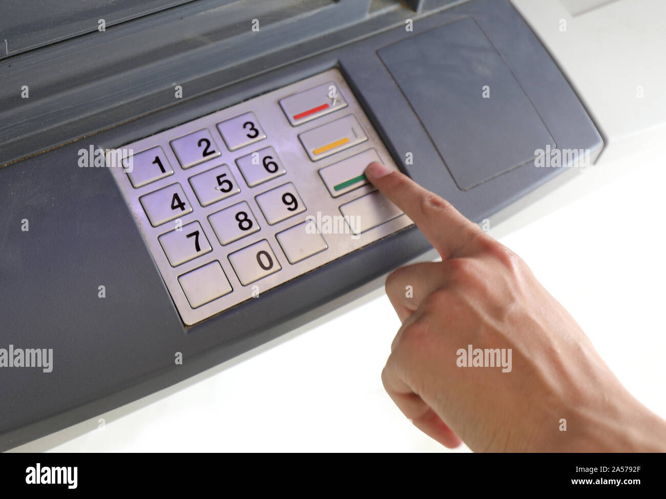 keyboard of an ATM machine and the hand Stock Photo - Alamy