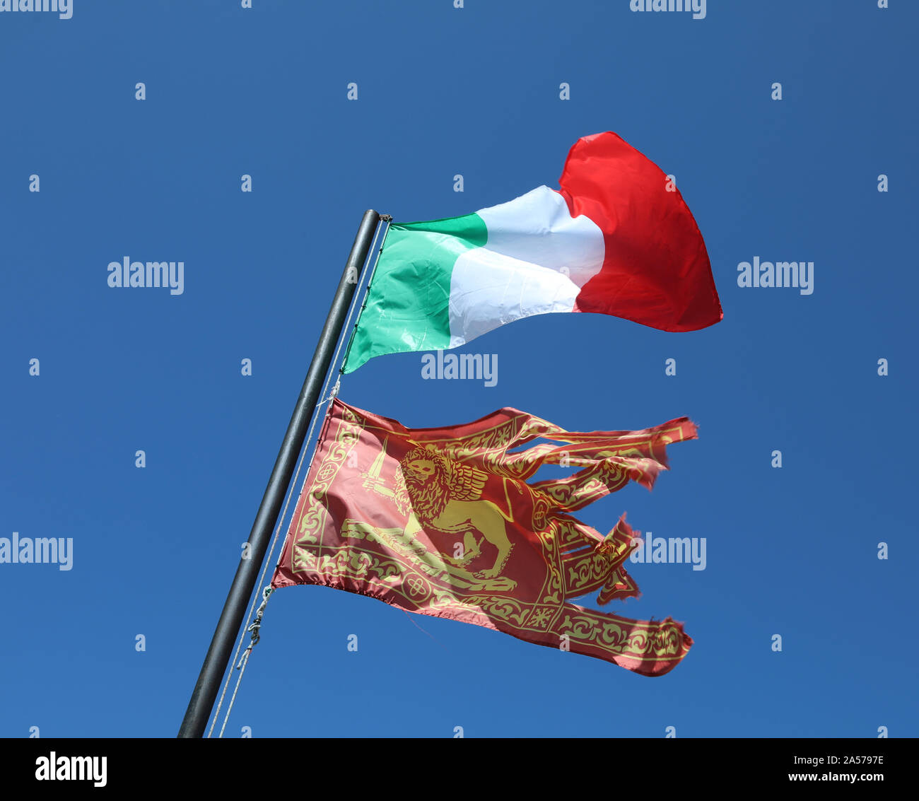 italian flag and Flag of Veneto Region in the sky Stock Photo - Alamy