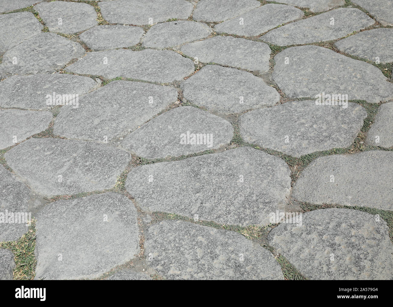 background of big stone of an ancient roman road Stock Photo - Alamy