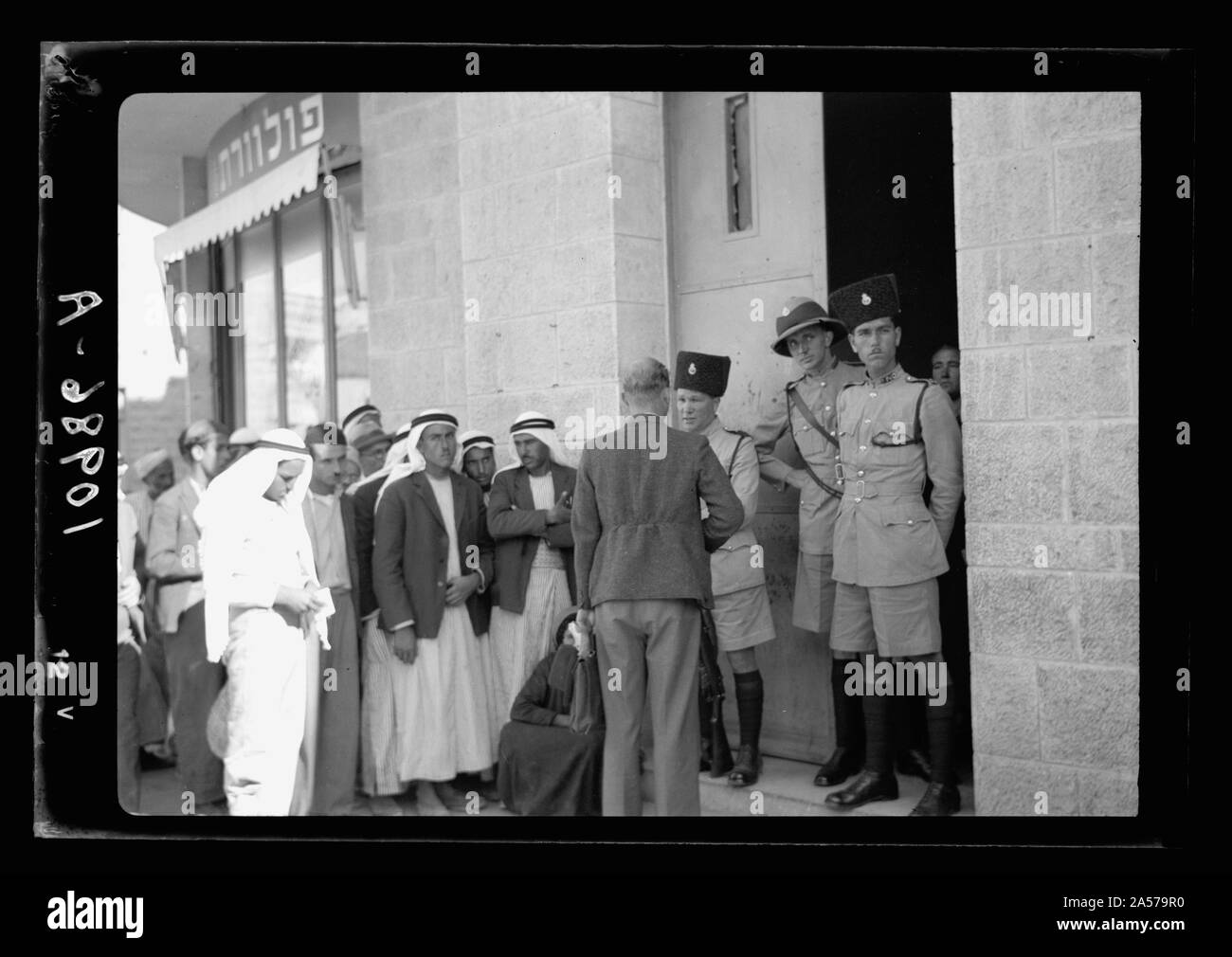 Volunteer queue outside government offices, waiting to register, mixed ...