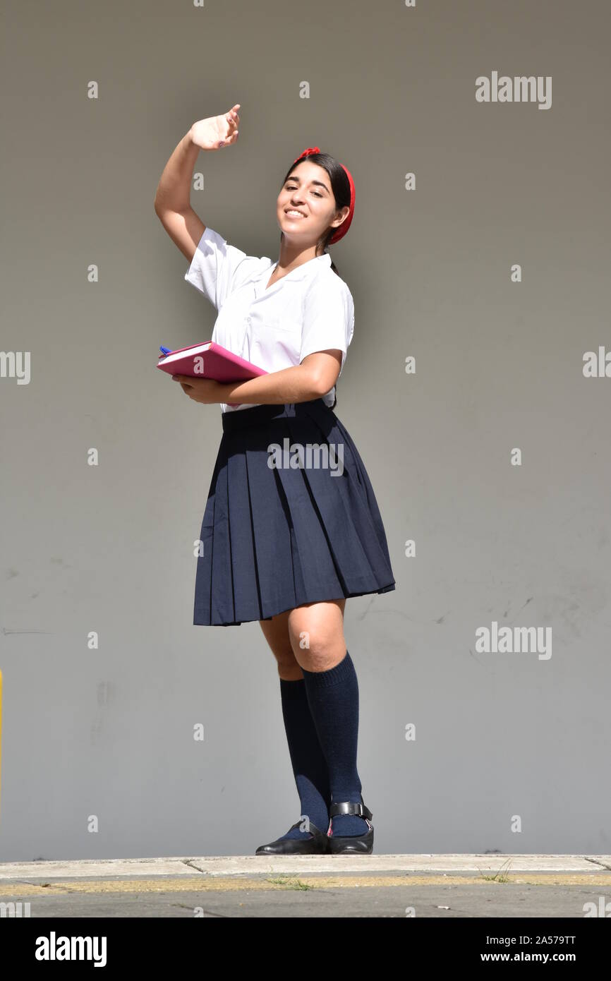 Posing Colombian Person With Notebook Stock Photo - Alamy