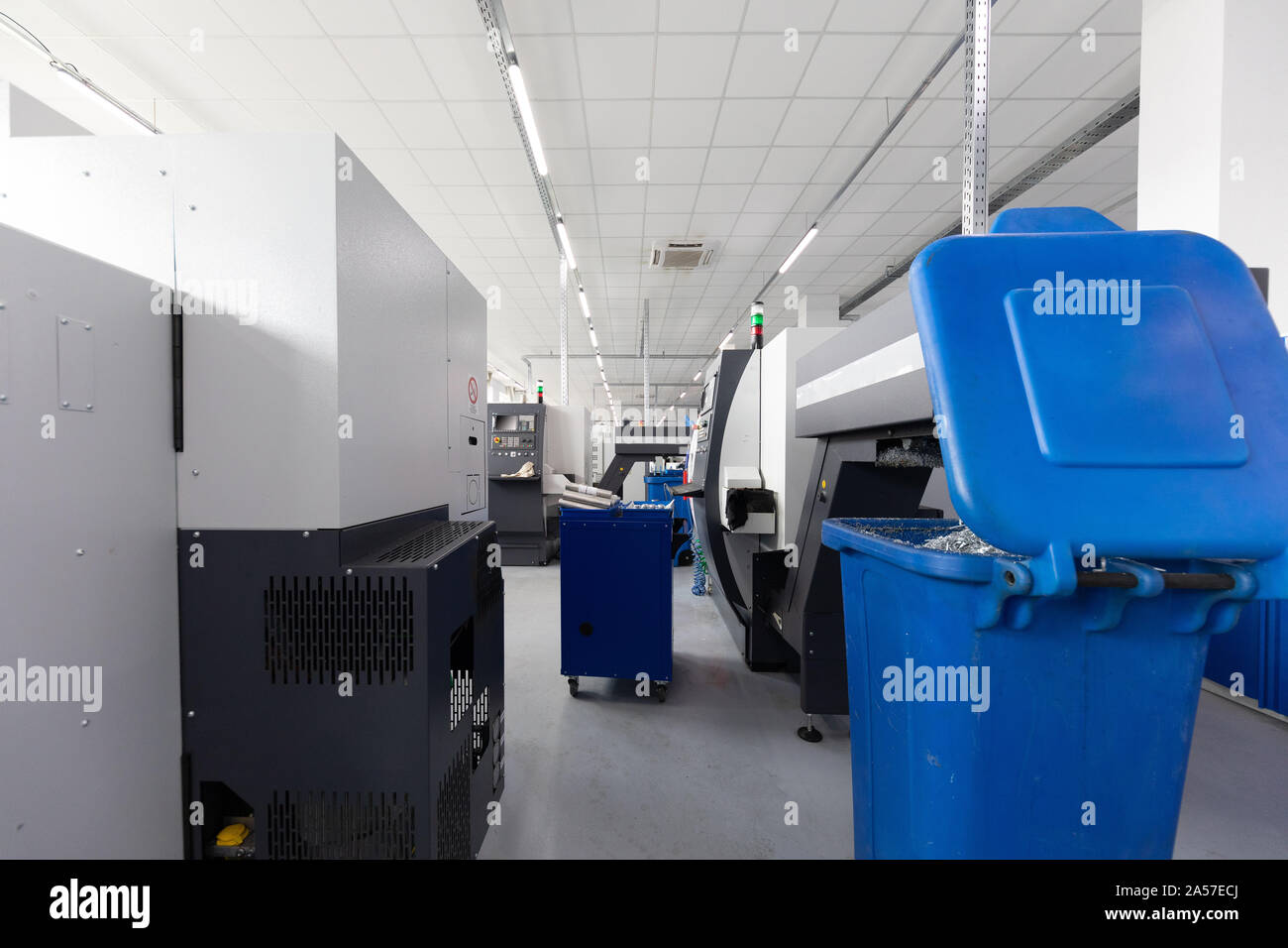 Inside of factory unit with containers filled with metal shavings Stock ...