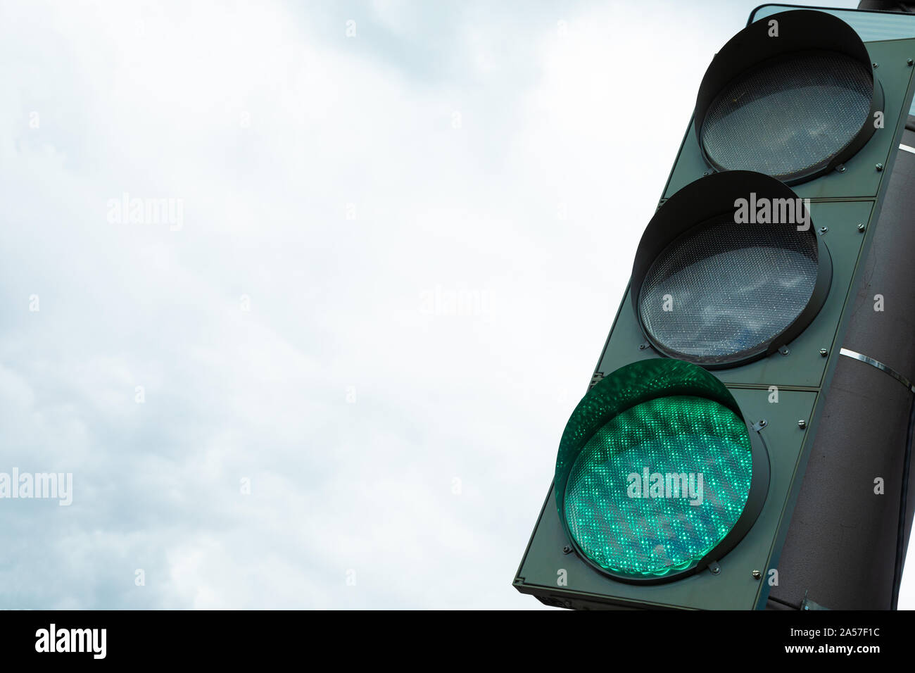 Green light of traffic-light allowing traffic on the road Stock Photo ...