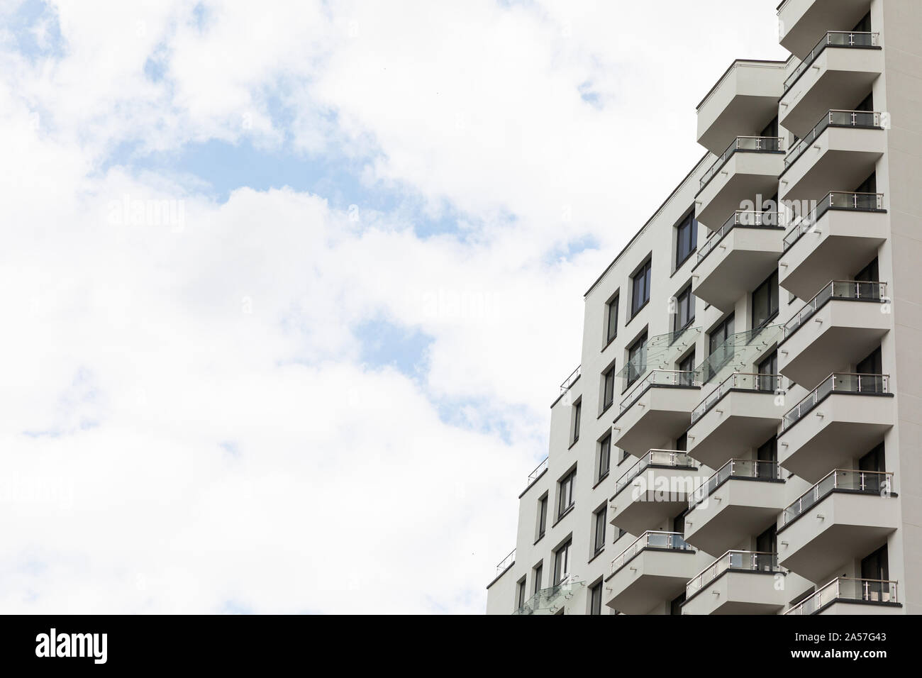 Facade of new colorful modern residential building side view on sunny ...