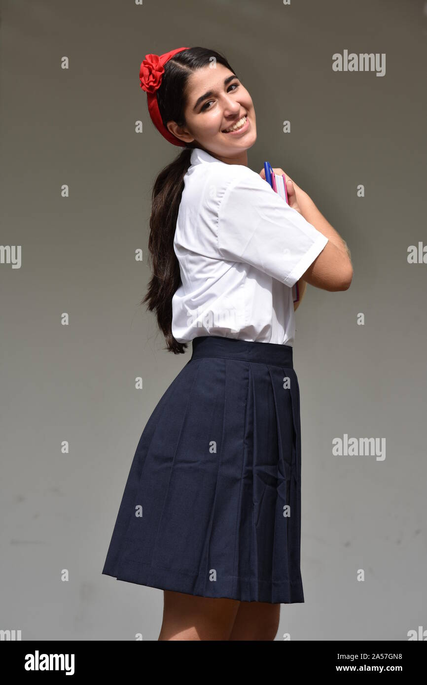 Happy Colombian Female Student Wearing School Uniform Stock Photo - Alamy