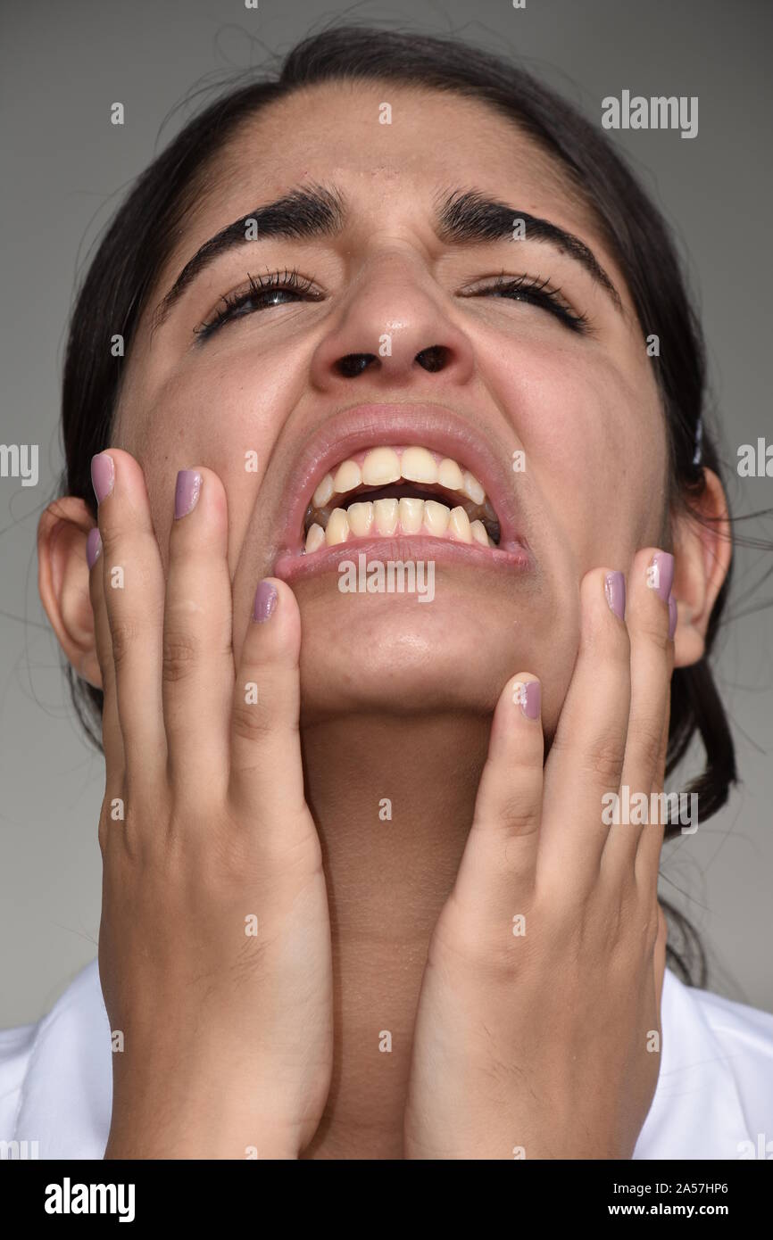 Cute Colombian Teenage Female And Anxiety Stock Photo - Alamy