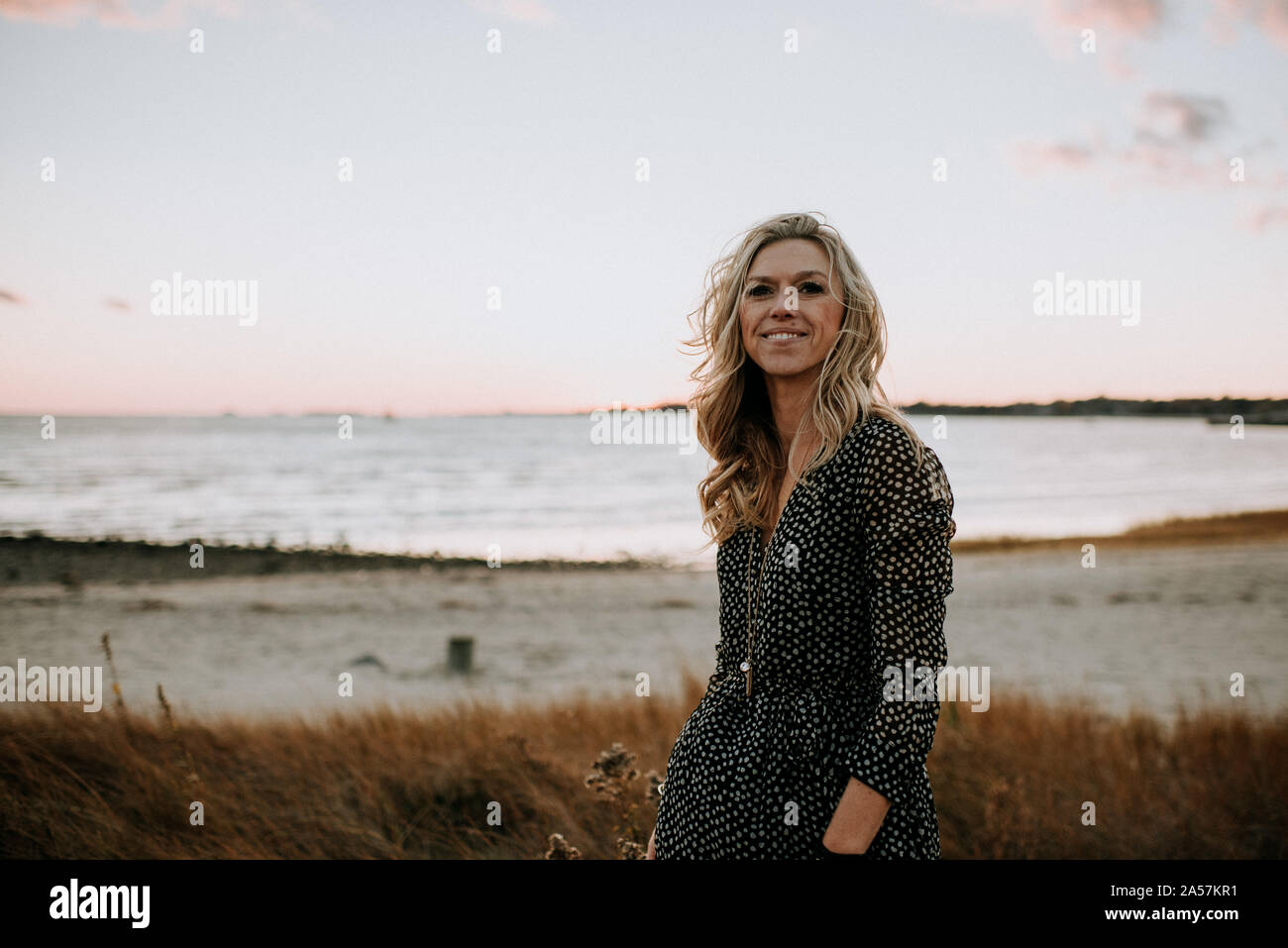 Woman beach eyes closed hi-res stock photography and images - Alamy