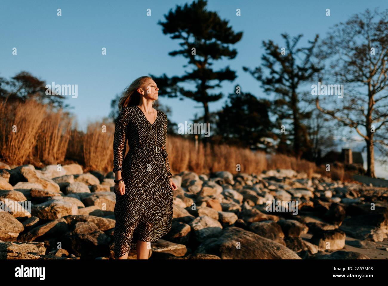 Woman beach eyes closed hi-res stock photography and images - Alamy