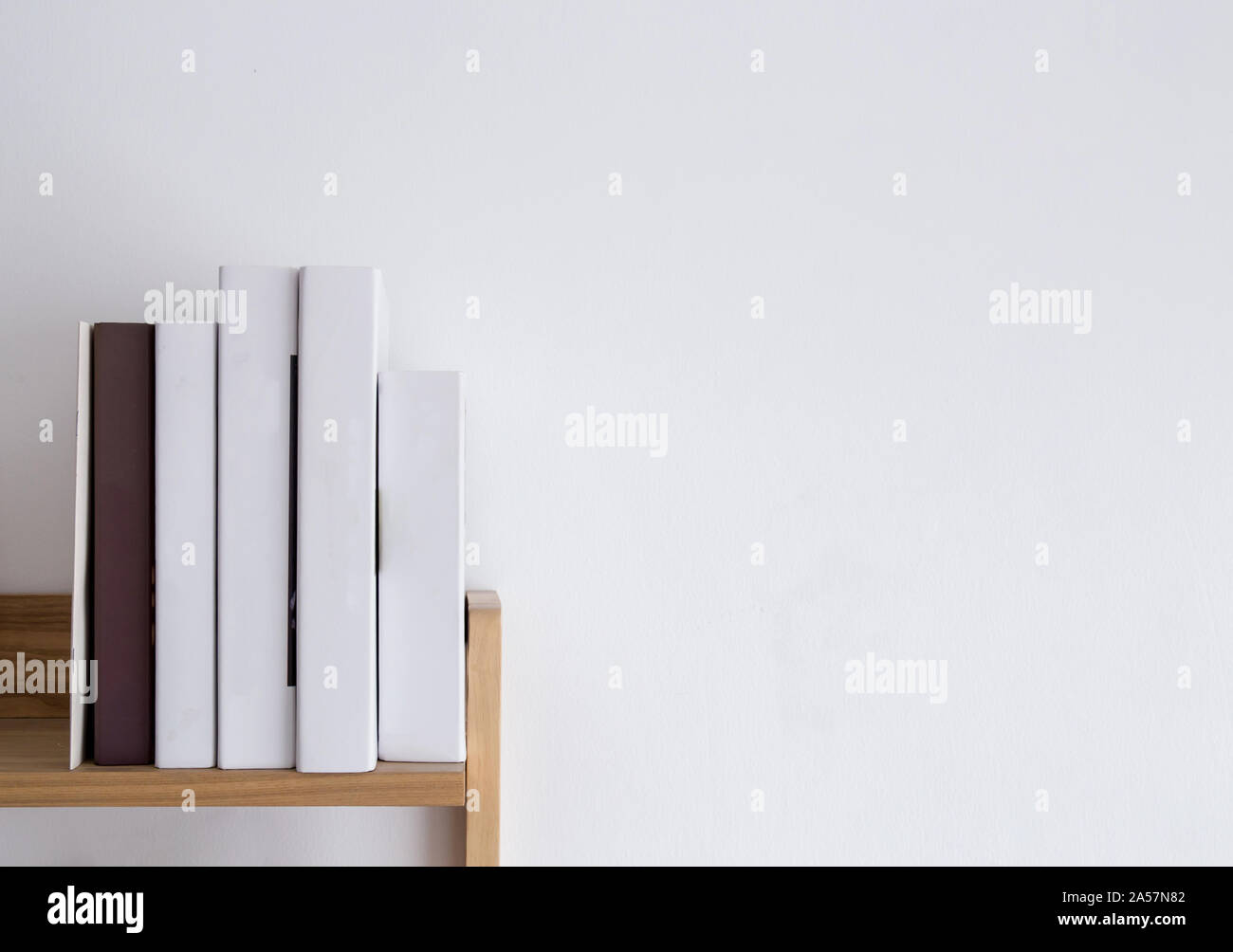 Book blank spines on bookshelf hi-res stock photography and images - Alamy