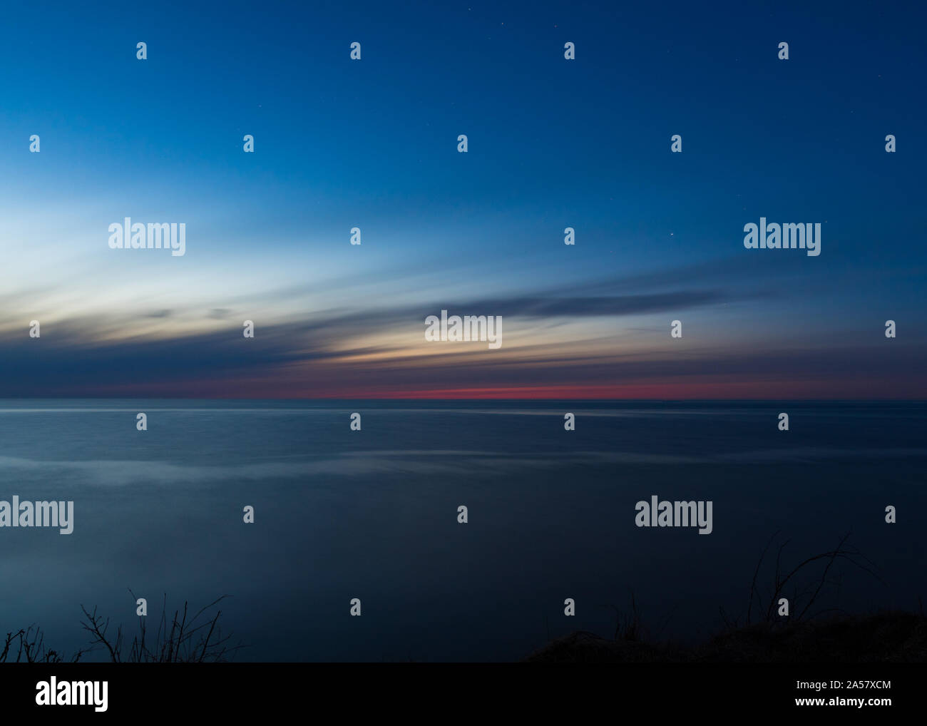 Night sky over ocean Stock Photo - Alamy