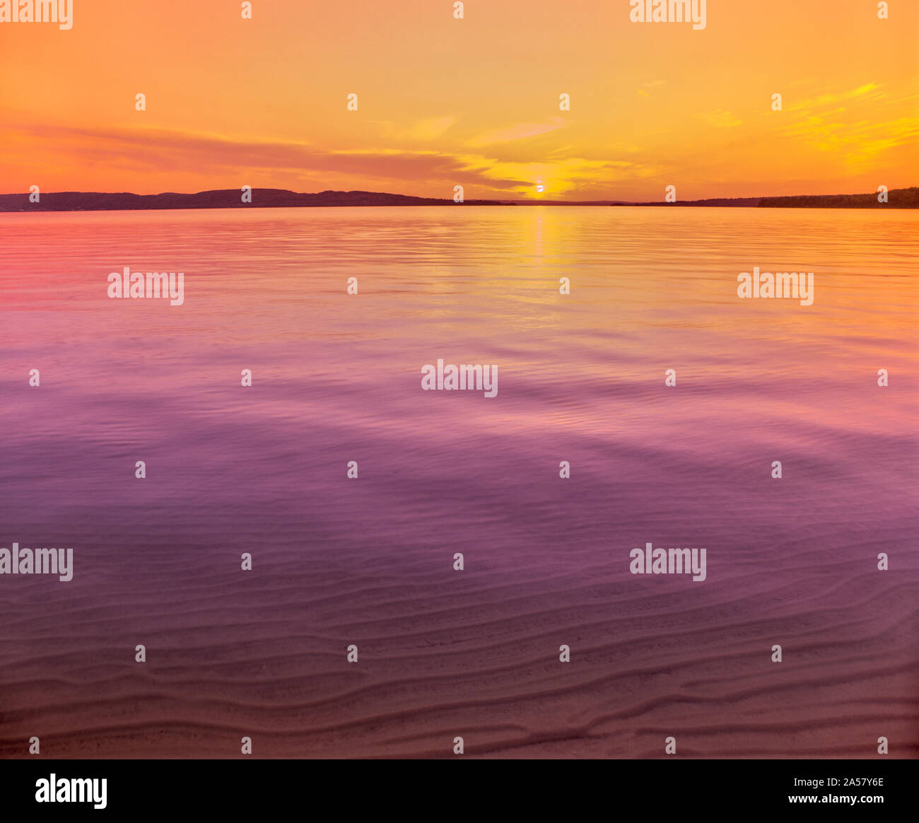 Scenic view of lake at dusk, Sand Point, Pictured Rocks National ...