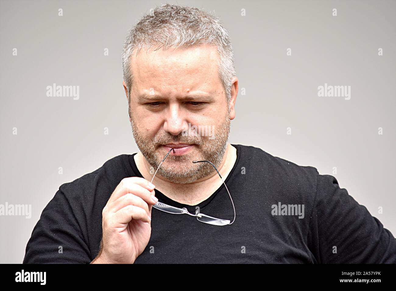 Overweight Adult Male Thinking Wearing Glasses Stock Photo - Alamy