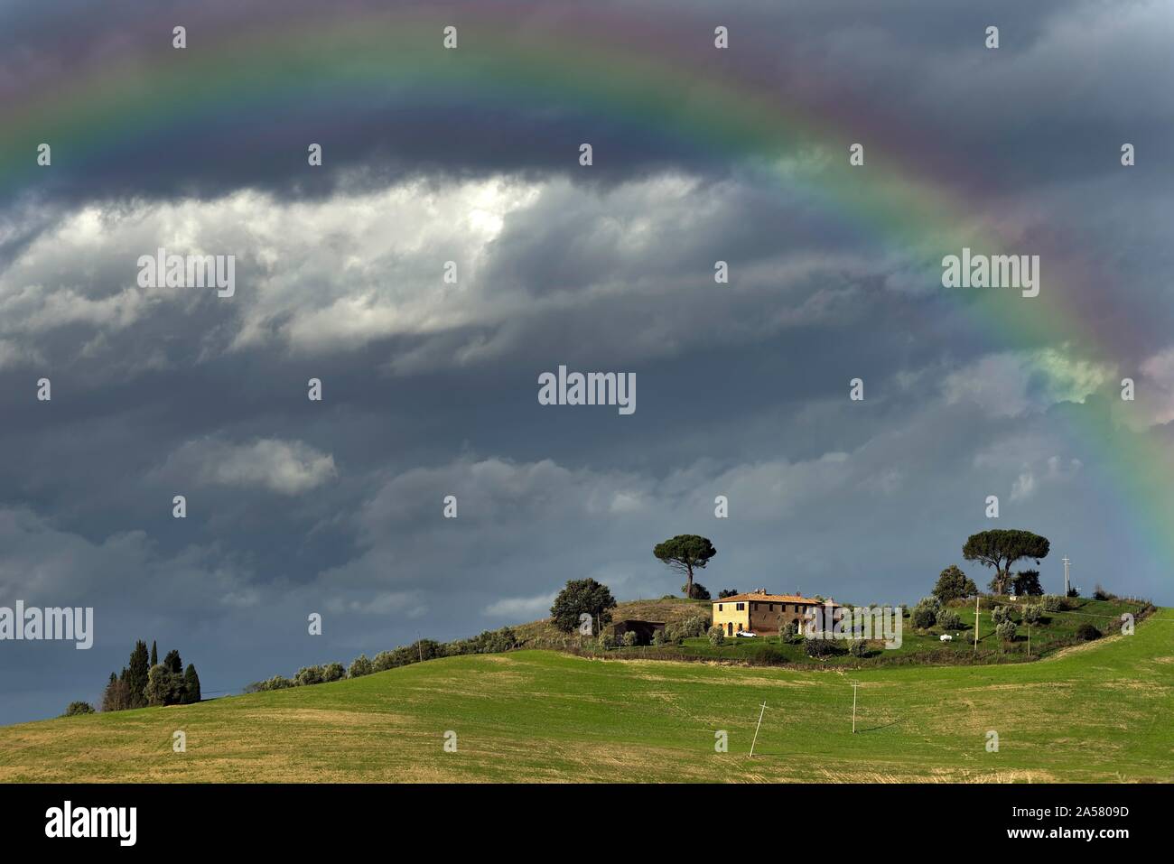 Rainbow over grass hi-res stock photography and images - Alamy