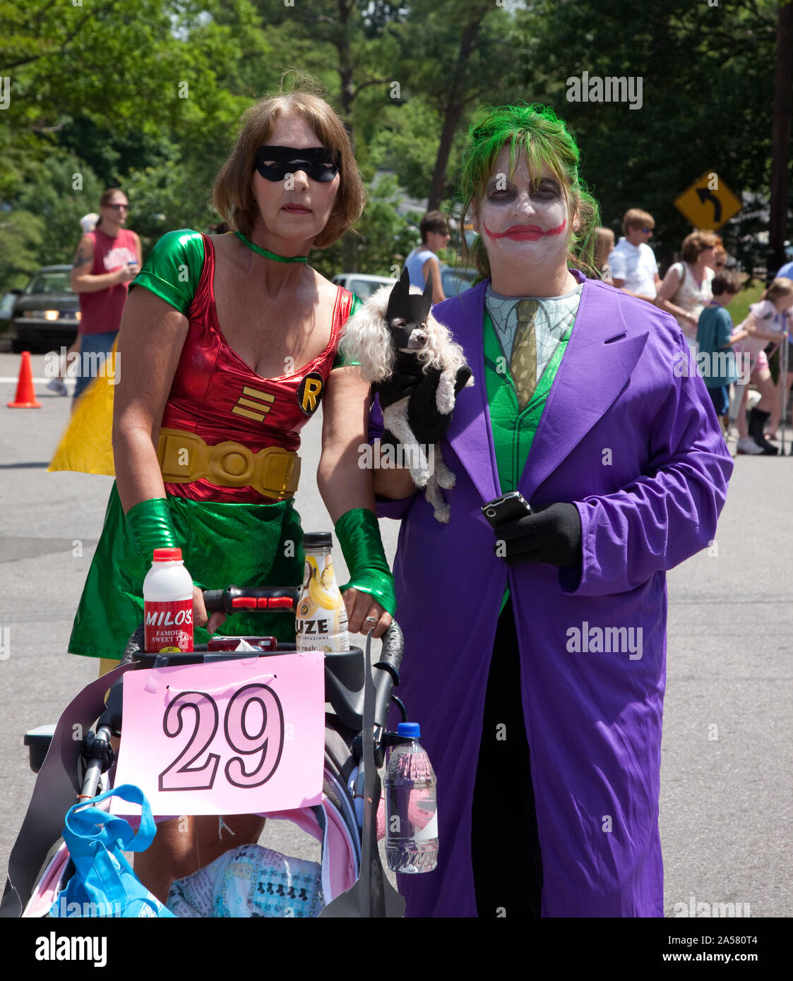 Wanda Newman and Teresa Phillips and their dog Cammi pose in Batman ...