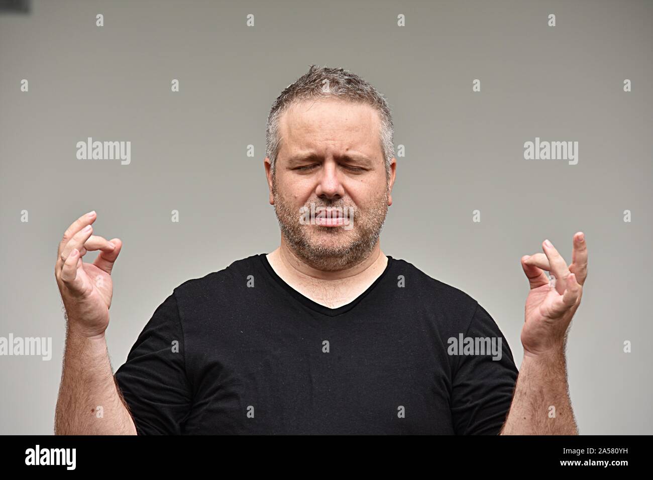 Male meditating hi-res stock photography and images - Alamy