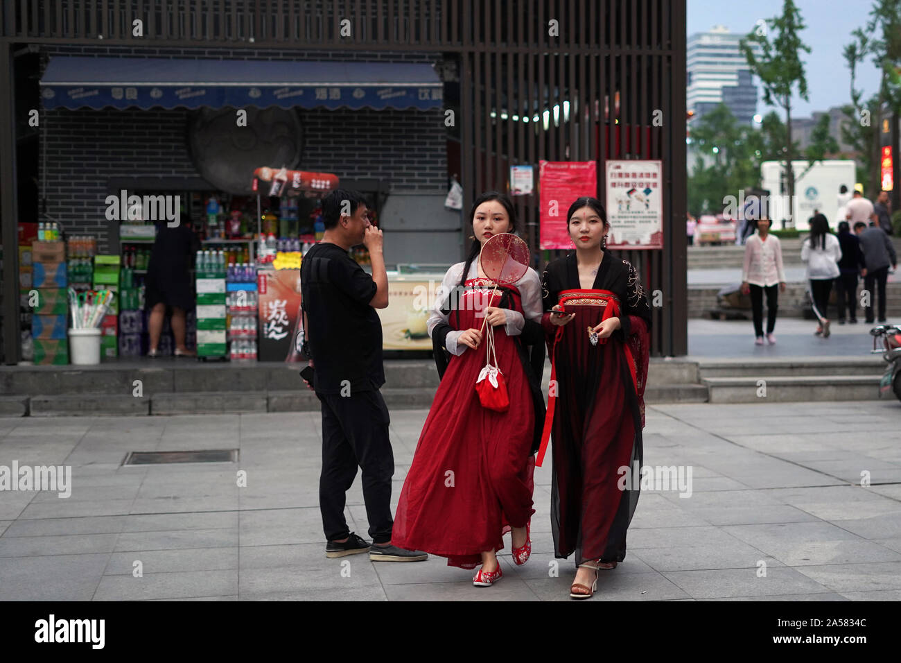 Two young women in red traditional clothes Stock Photo - Alamy