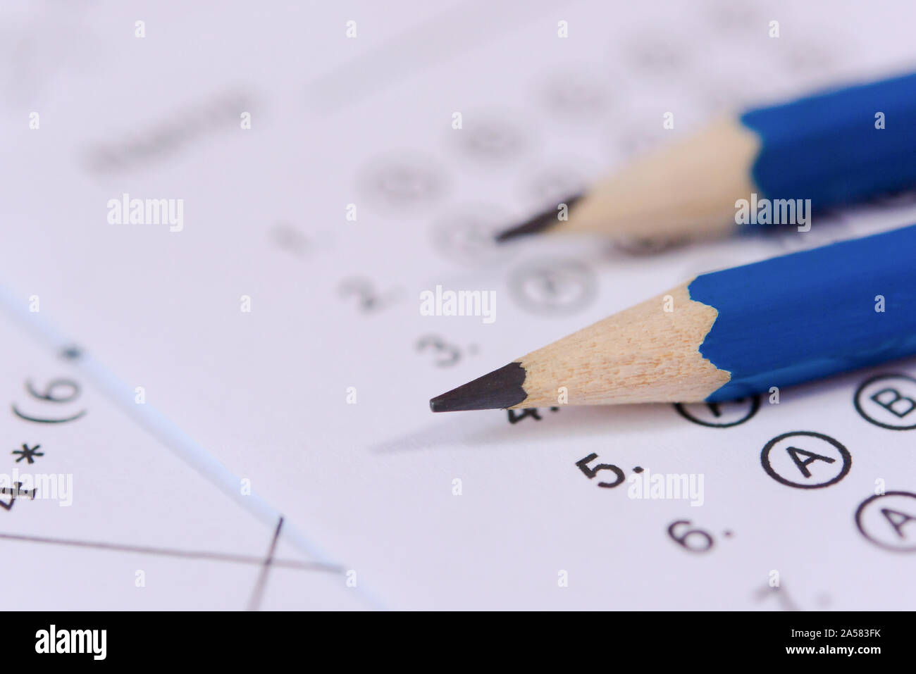 Pencil on answer sheets or Standardized test form with answers bubbled ...