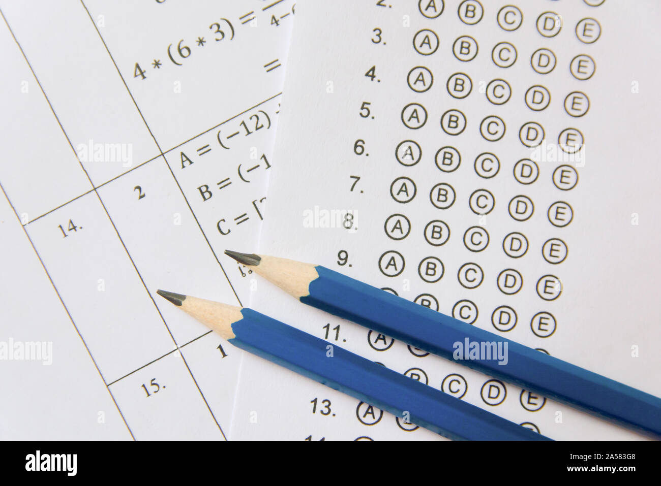 Pencil on answer sheets or Standardized test form with answers bubbled ...