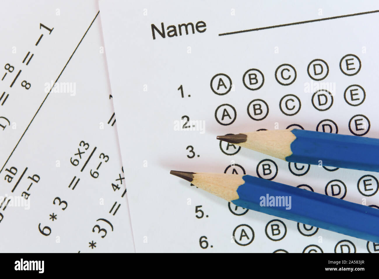 Pencil on answer sheets or Standardized test form with answers bubbled ...