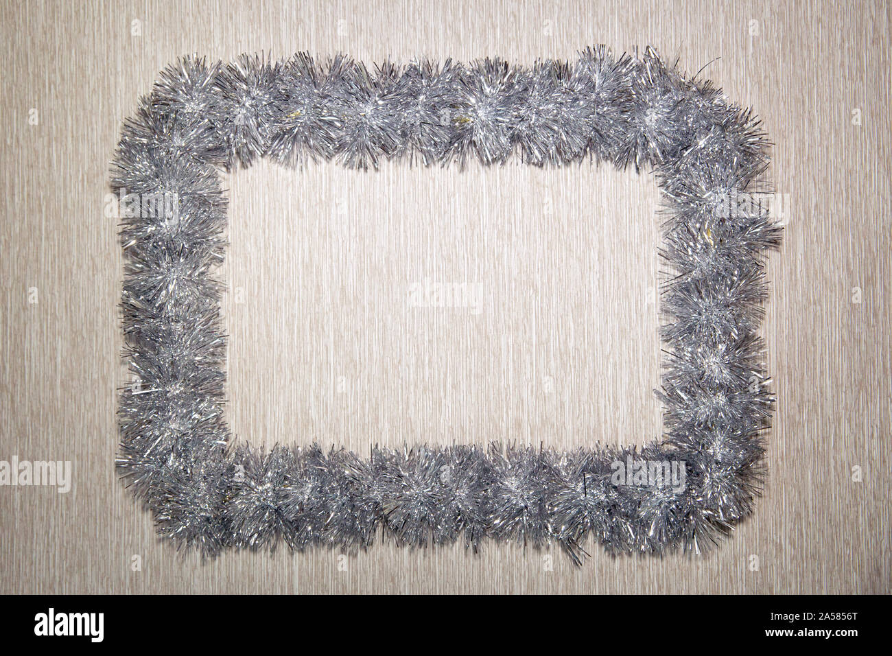 Frame made from silver tinsel decorations for christmas. Christmas ...