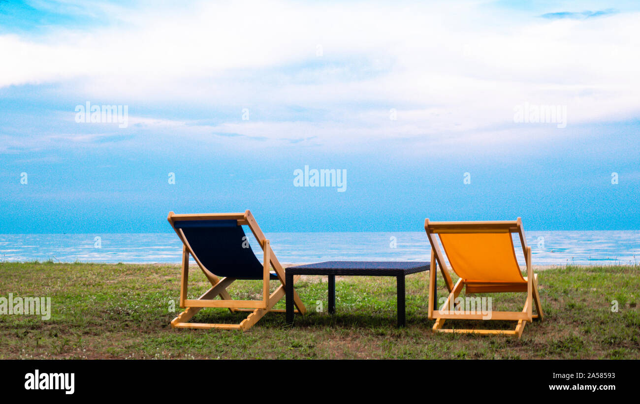 Empty deck chair .Beautiful color chairs on the beach. Blue sky ...