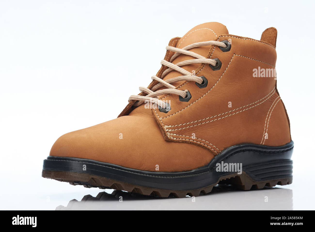 Brown casual shoe angle view isolated on white background Stock Photo ...