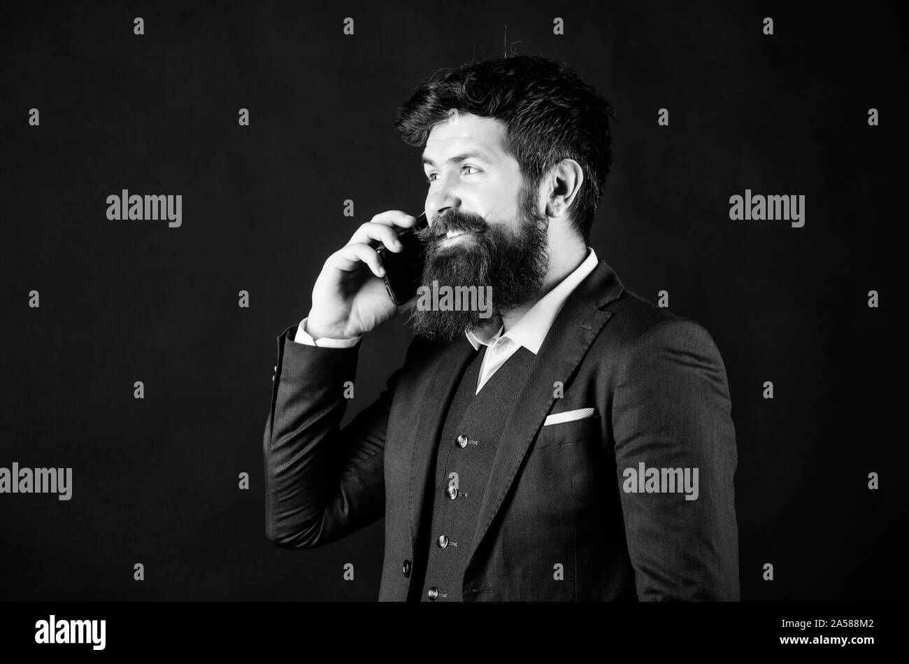 Mobile negotiations. Businessman well groomed mature man hold ...