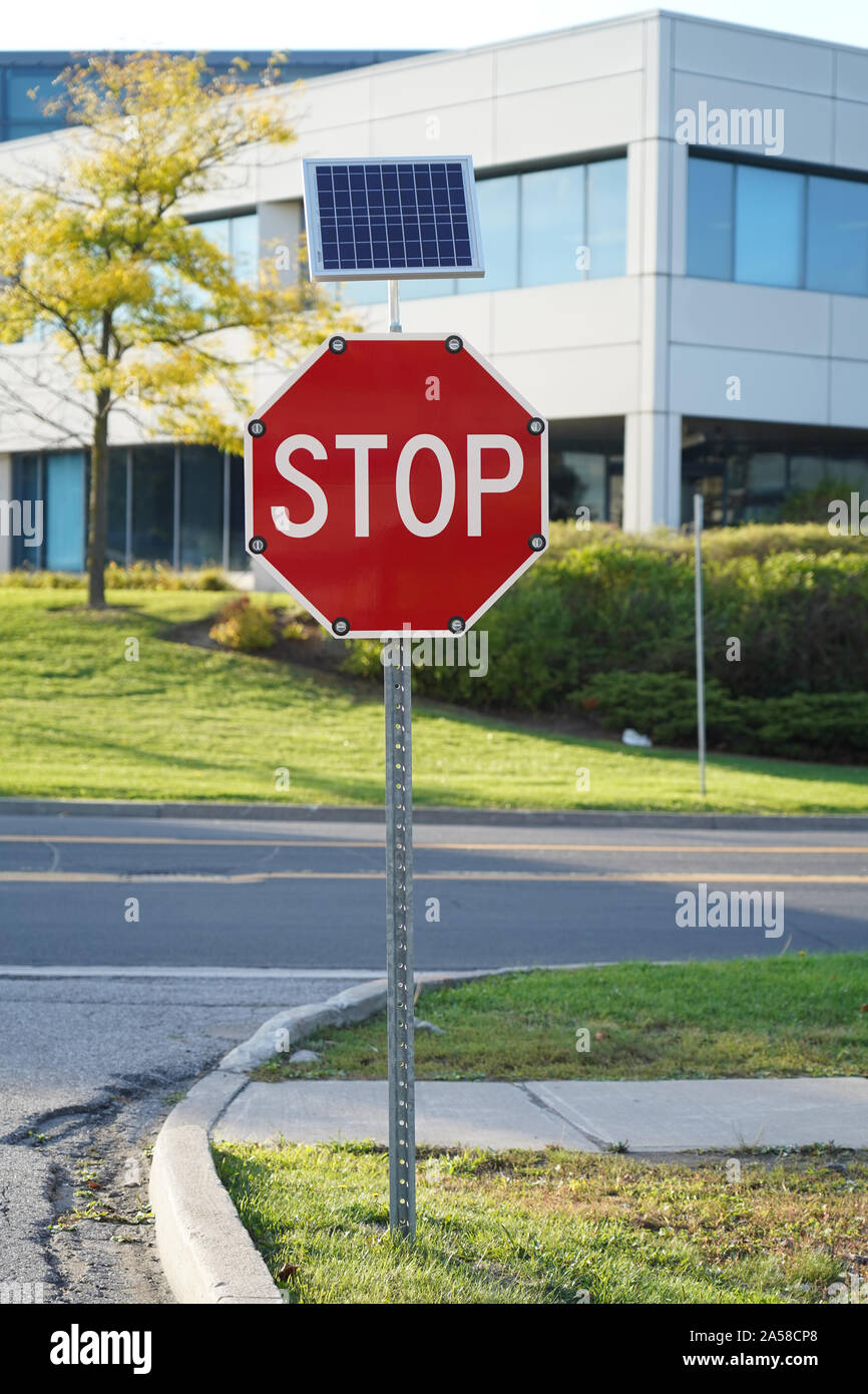 solar powered stop sign outdoor in a business office area Stock Photo ...