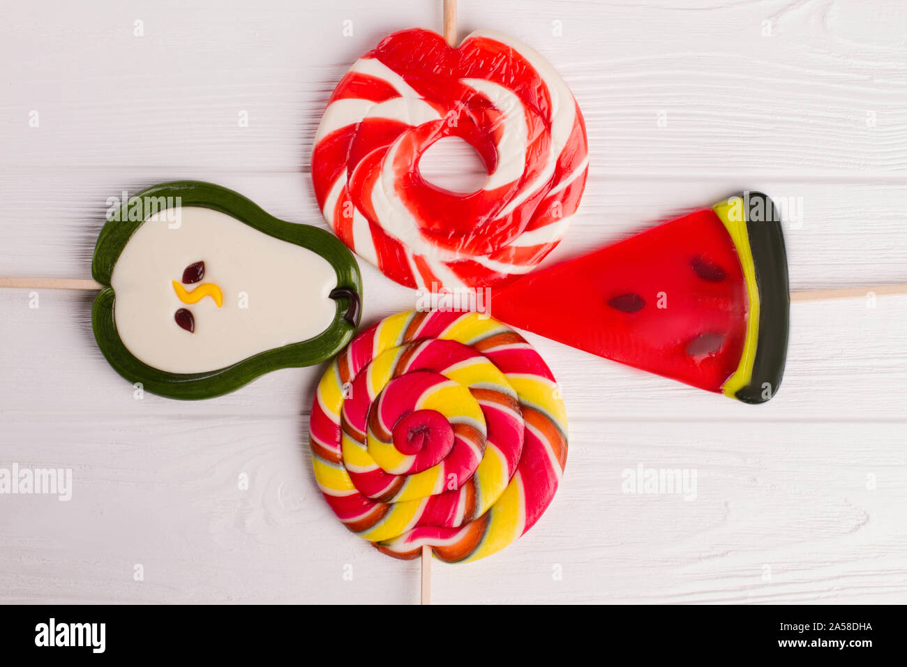 Large sweet lollipops of different shapes Stock Photo - Alamy