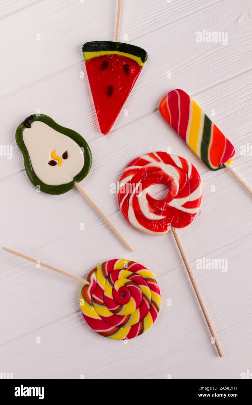 Assorted colorful lollipops, top view Stock Photo - Alamy