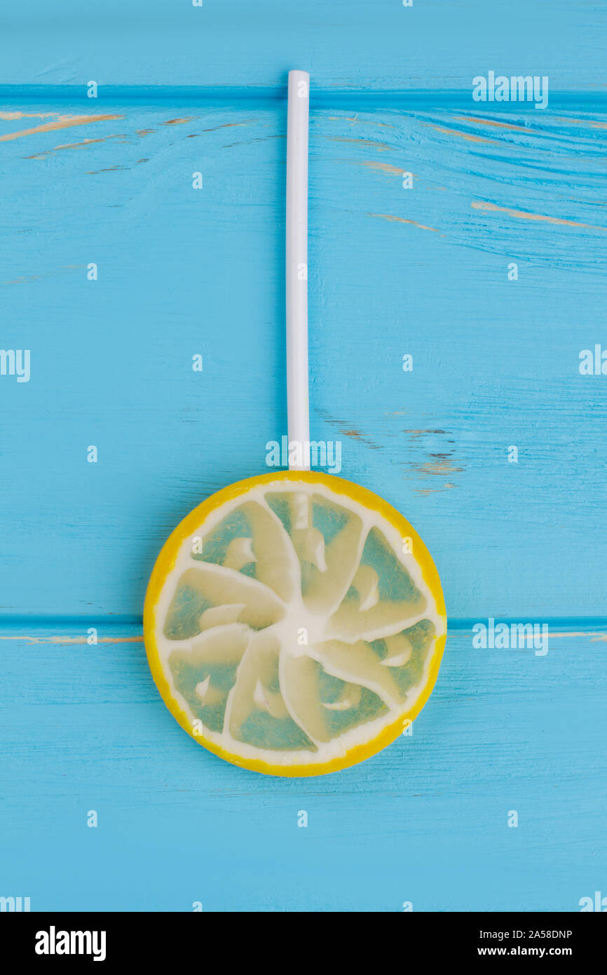 Candy lemon slice on stick Stock Photo - Alamy