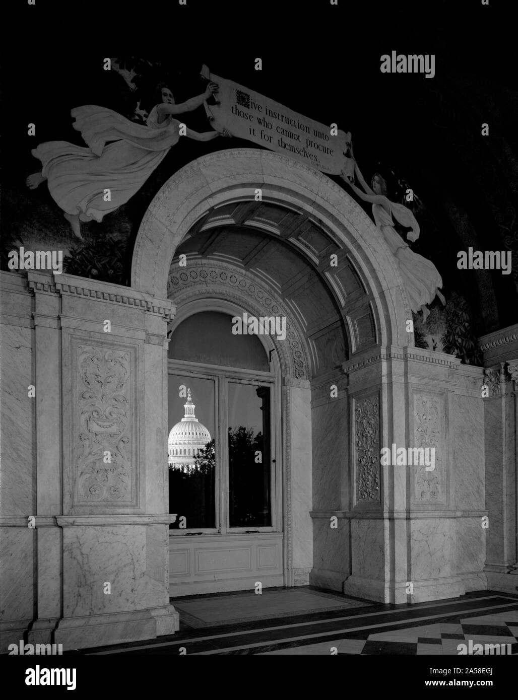 U.S. Capitol, viewed through a window at the Library of Congress's ...