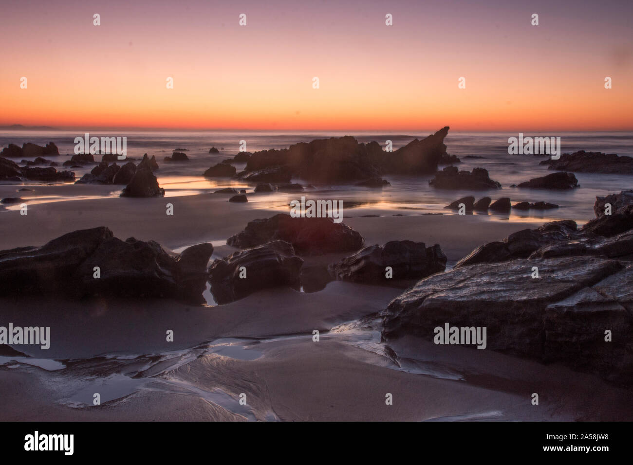 Sunset in Barrika beach, Basque Country Stock Photo - Alamy