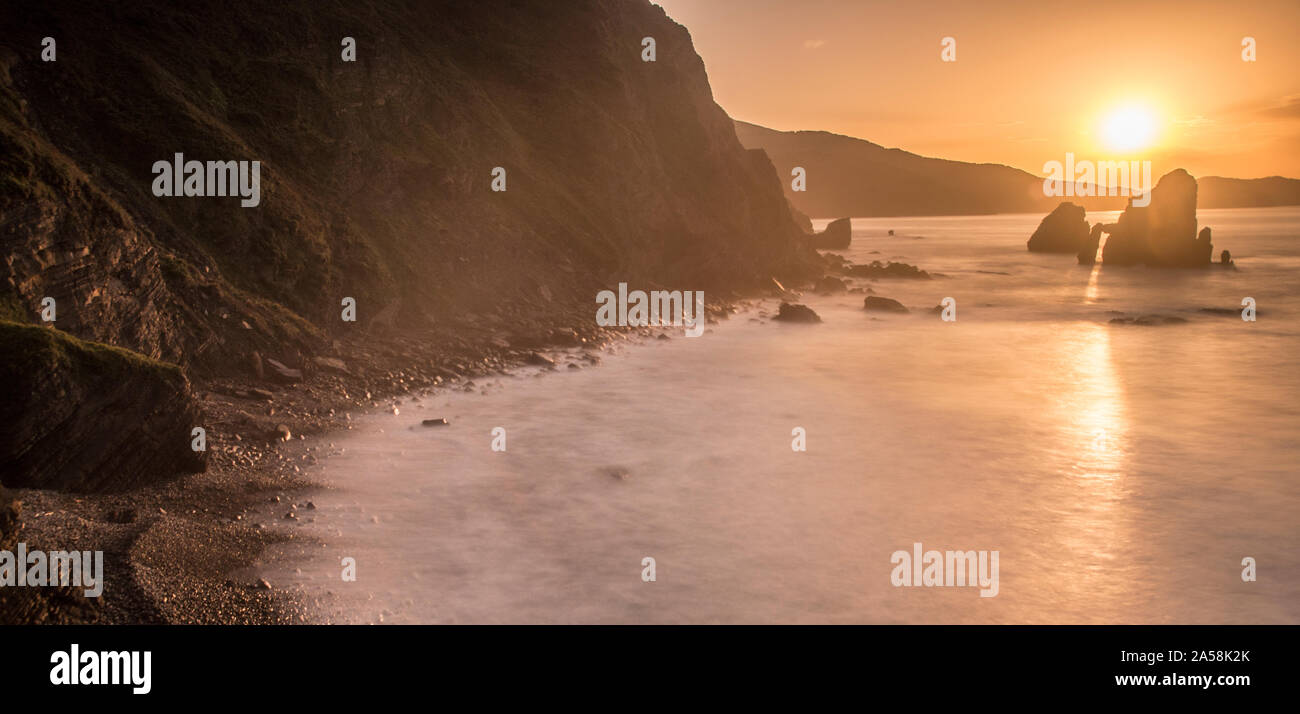 sunset at the basque coast in gaztelugatxe, northern spain Stock Photo ...
