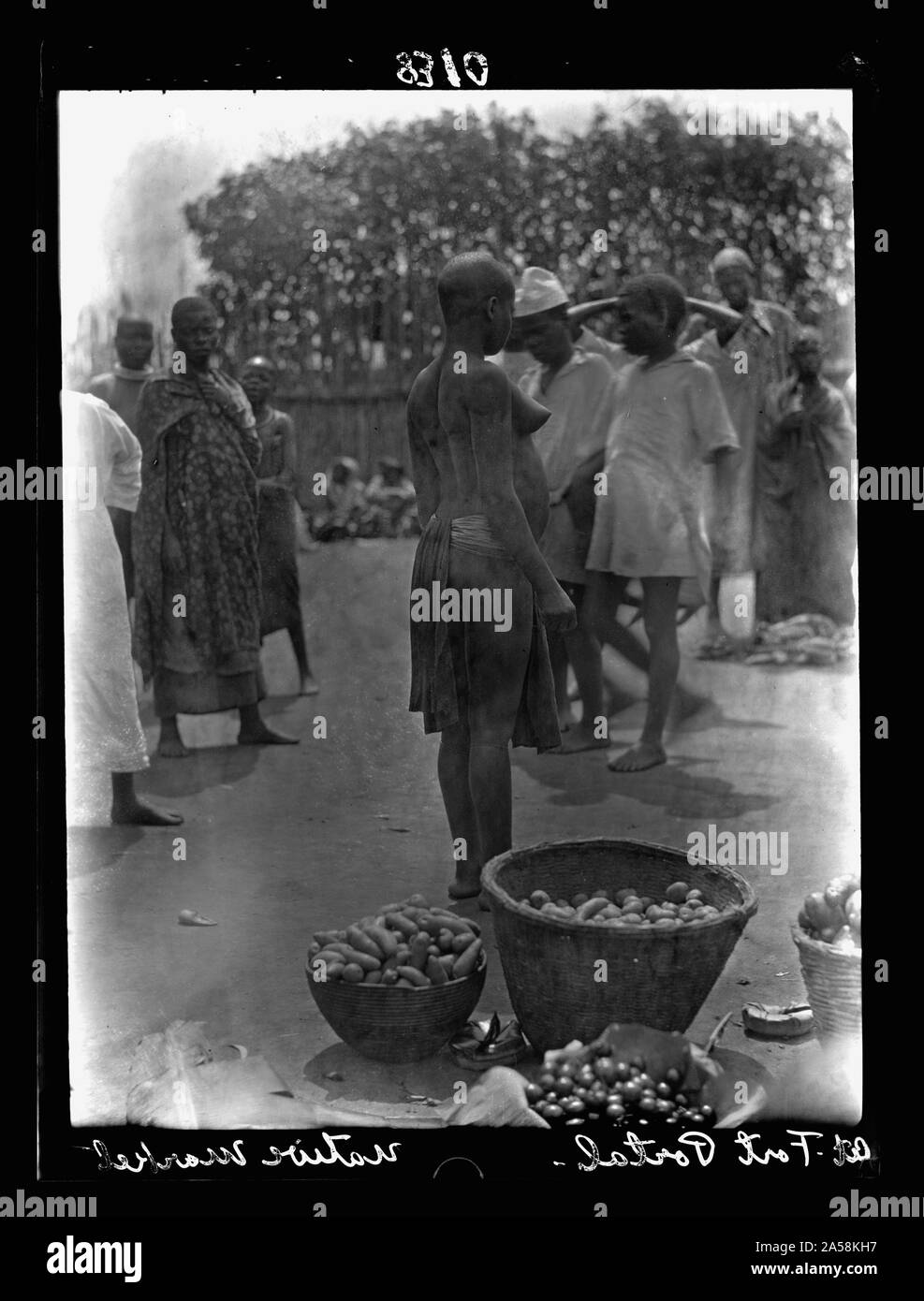 Uganda. From Hoima to Fort Portal. Types in the native market. Cucumber ...