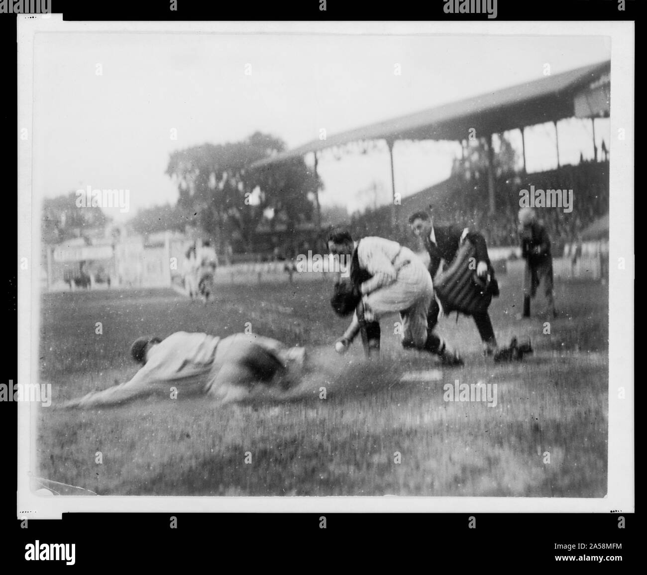 Baseball game runner on Black and White Stock Photos & Images - Alamy