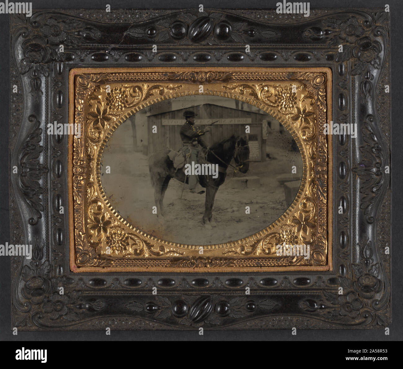 Unidentified cavalry soldier in Union uniform with saber, revolver, and ...