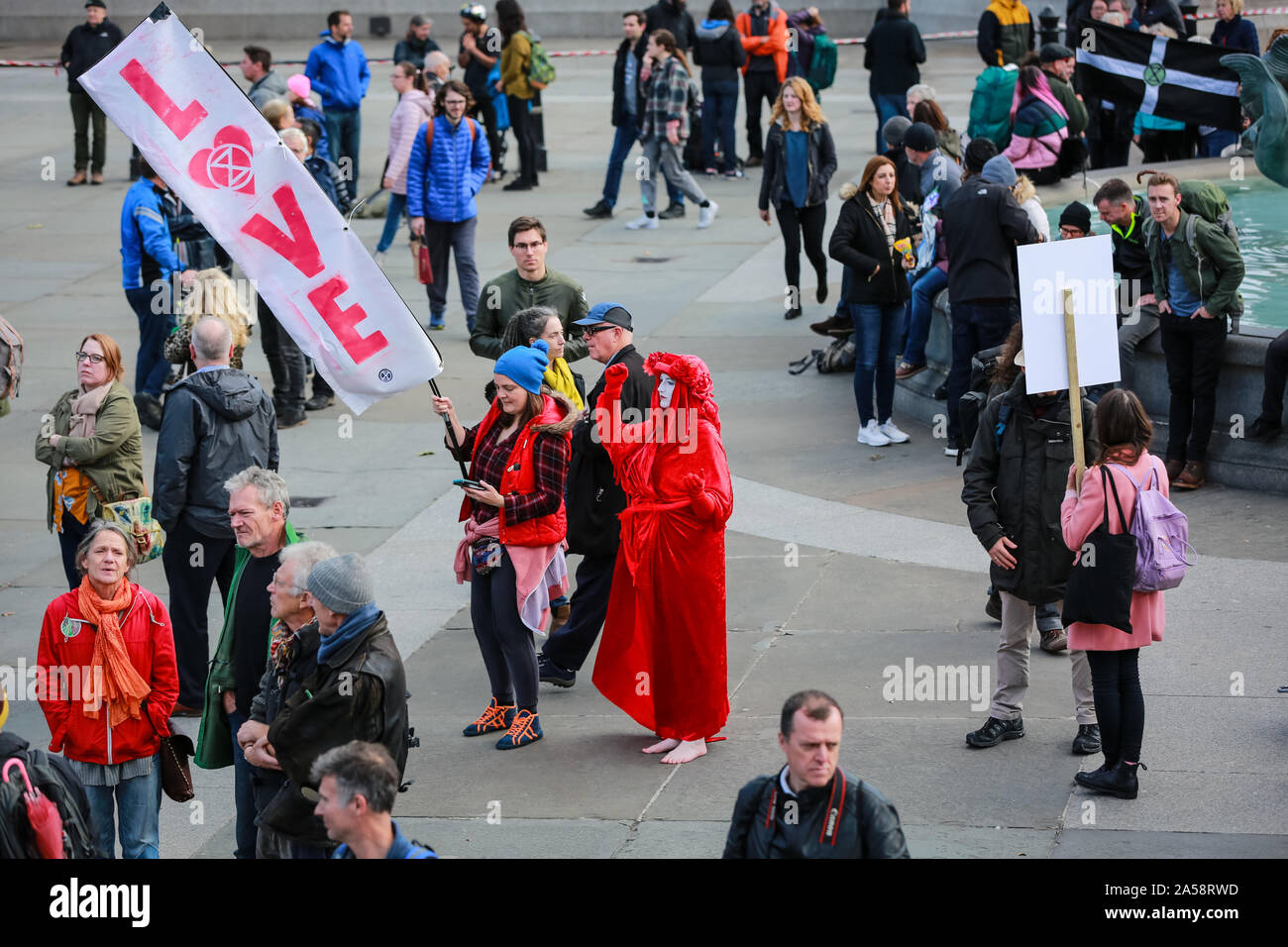 London, UK, 18 Oct 2019. Extinction Rebellion, Red Rebel Brigade ...
