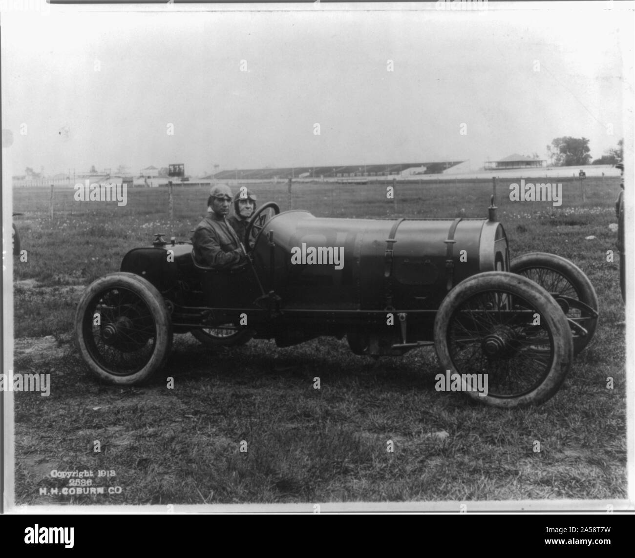 Men seated Black and White Stock Photos & Images - Alamy