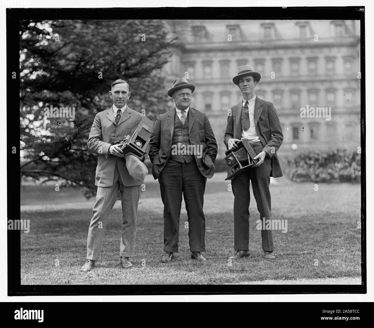 Photographers media camera Cut Out Stock Images & Pictures - Alamy