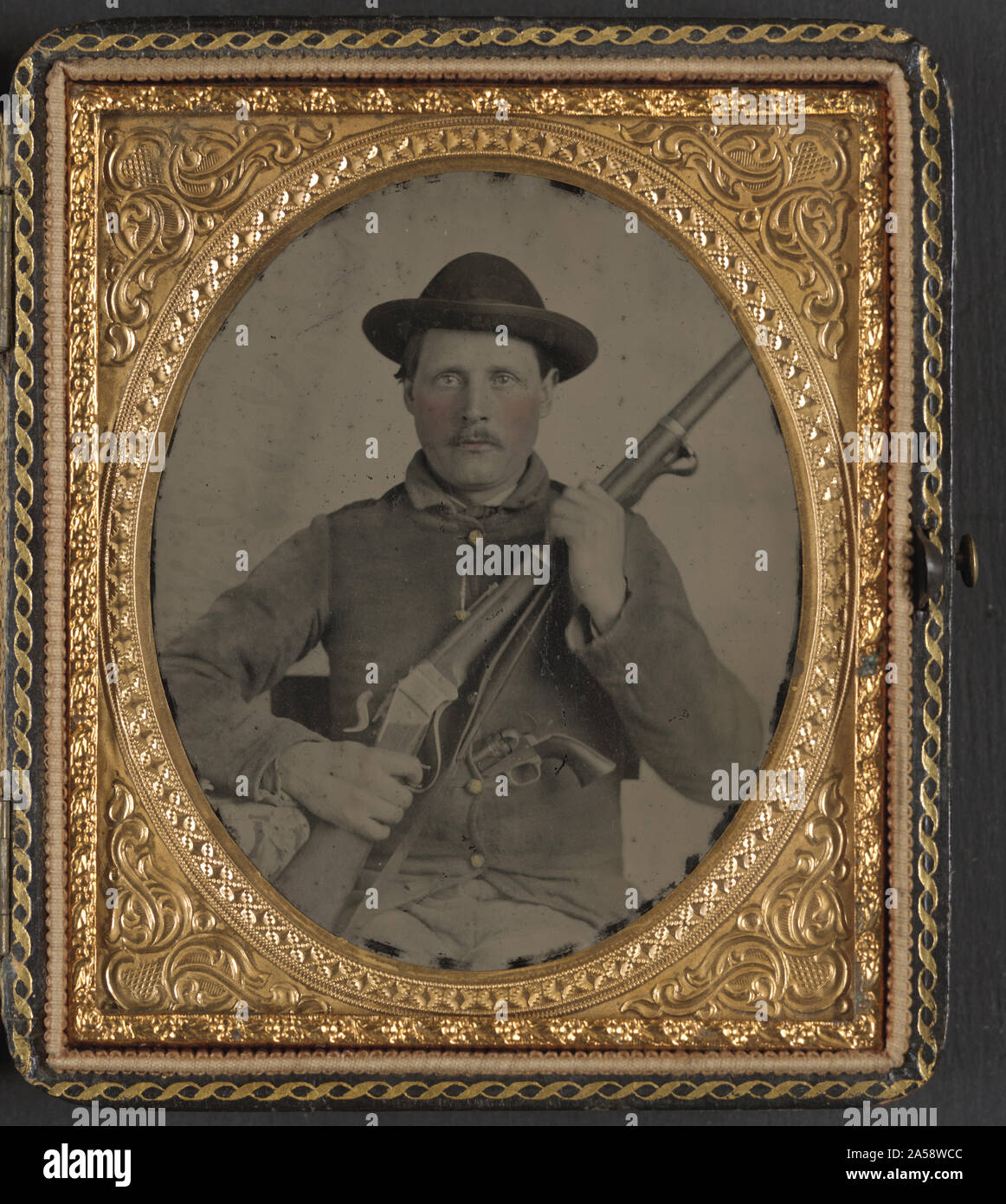 Unidentified soldier in Confederate uniform with Berdan's Sharps rifle ...