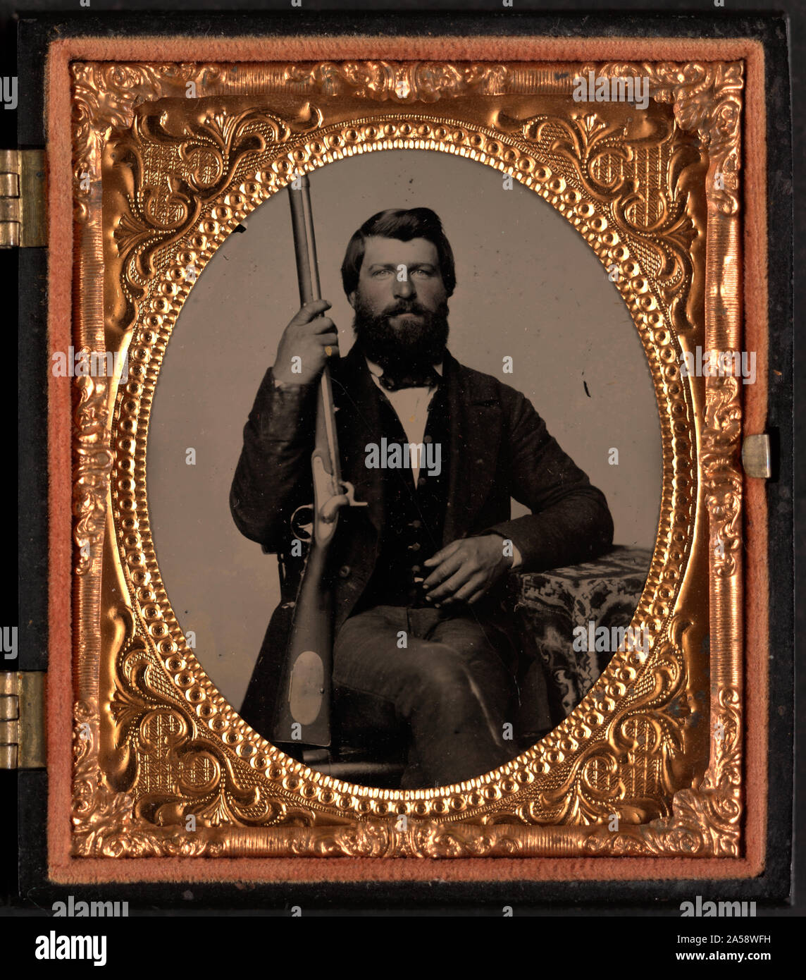 Unidentified soldier in Confederate uniform with converted Model 1817 ...
