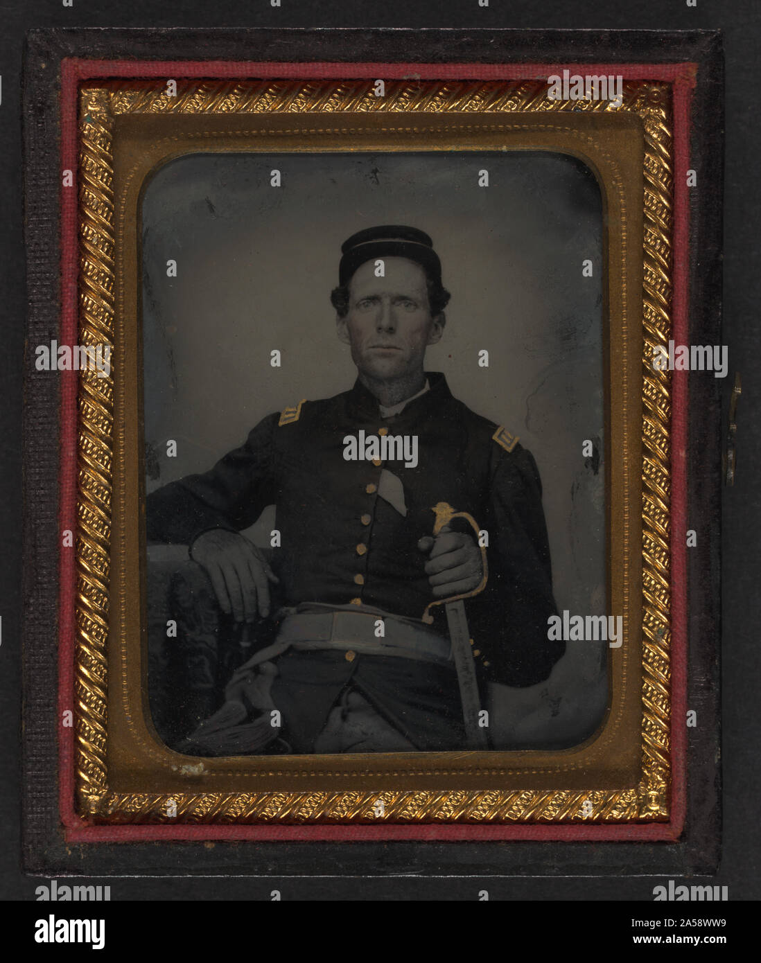 Unidentified soldier in Union captain's uniform with artillery saber ...