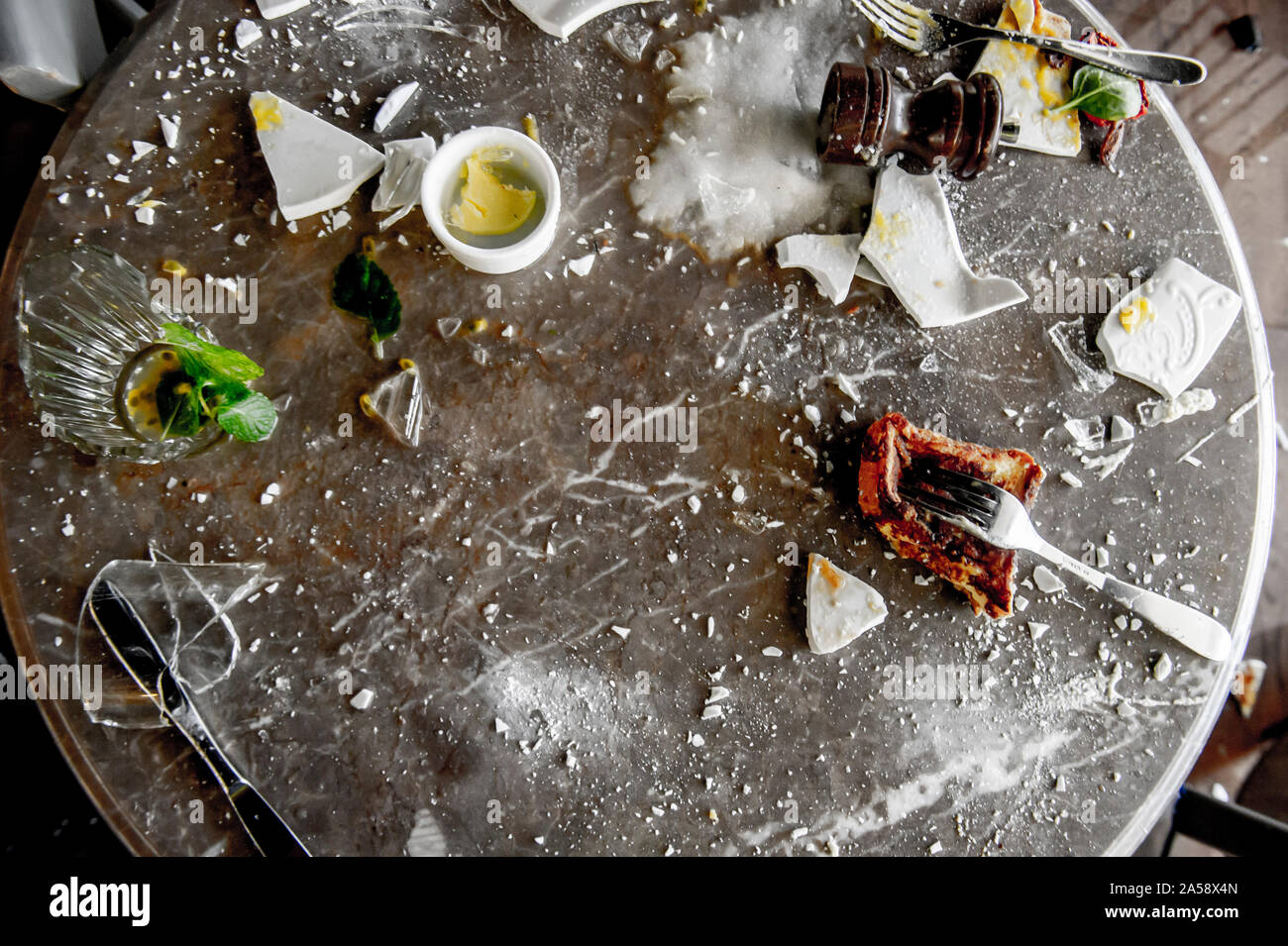 Overturned tables hi-res stock photography and images - Alamy