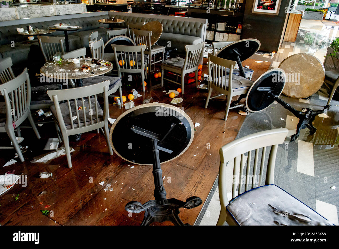 Overturned tables hi-res stock photography and images - Alamy