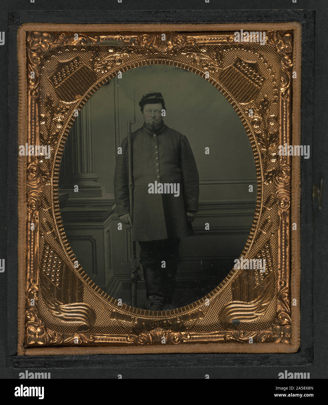 Unidentified soldier in Union frock and kepi with bayoneted flintlock ...